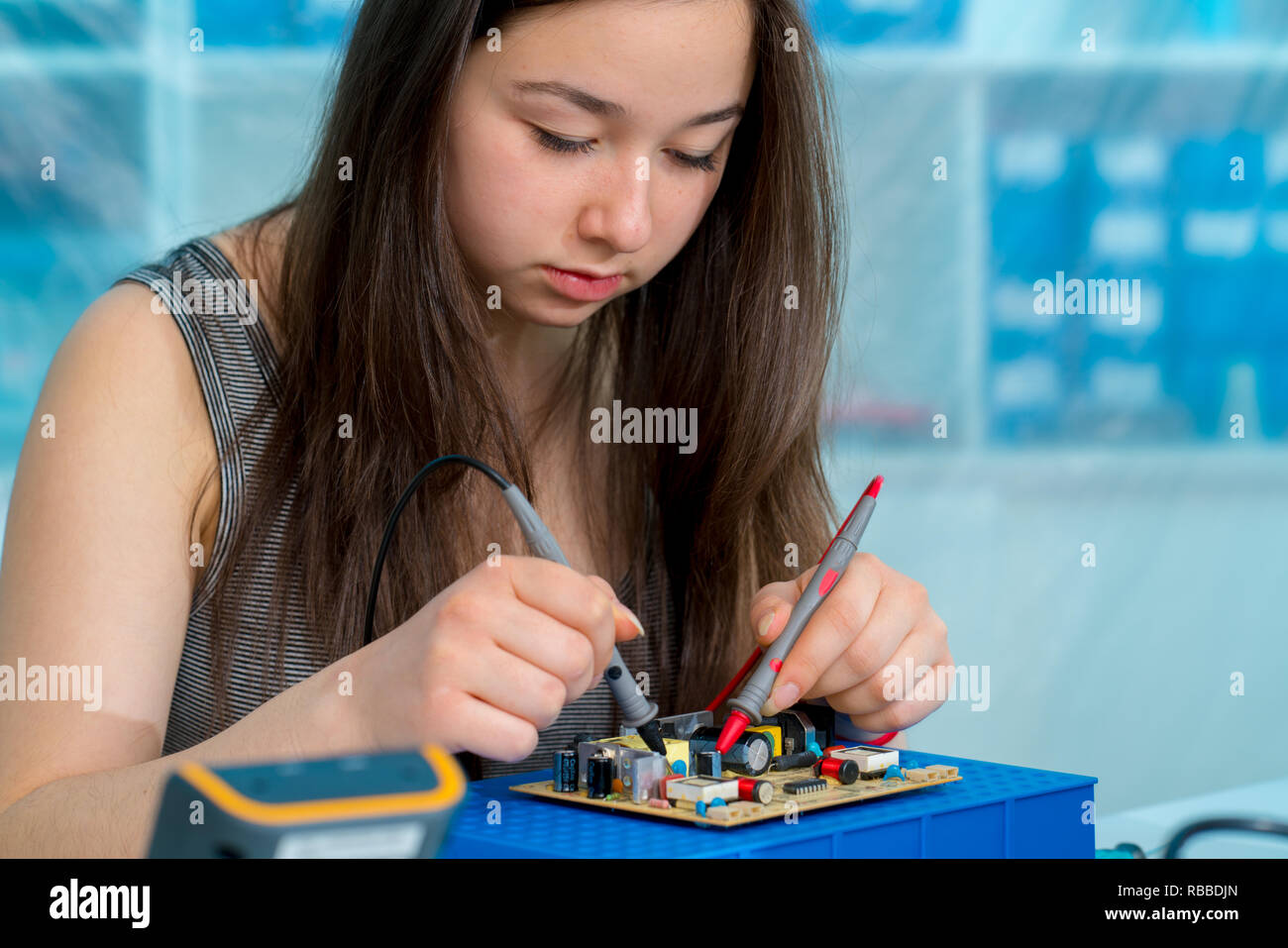 Young woman in robotics laboratory Stock Photo - Alamy