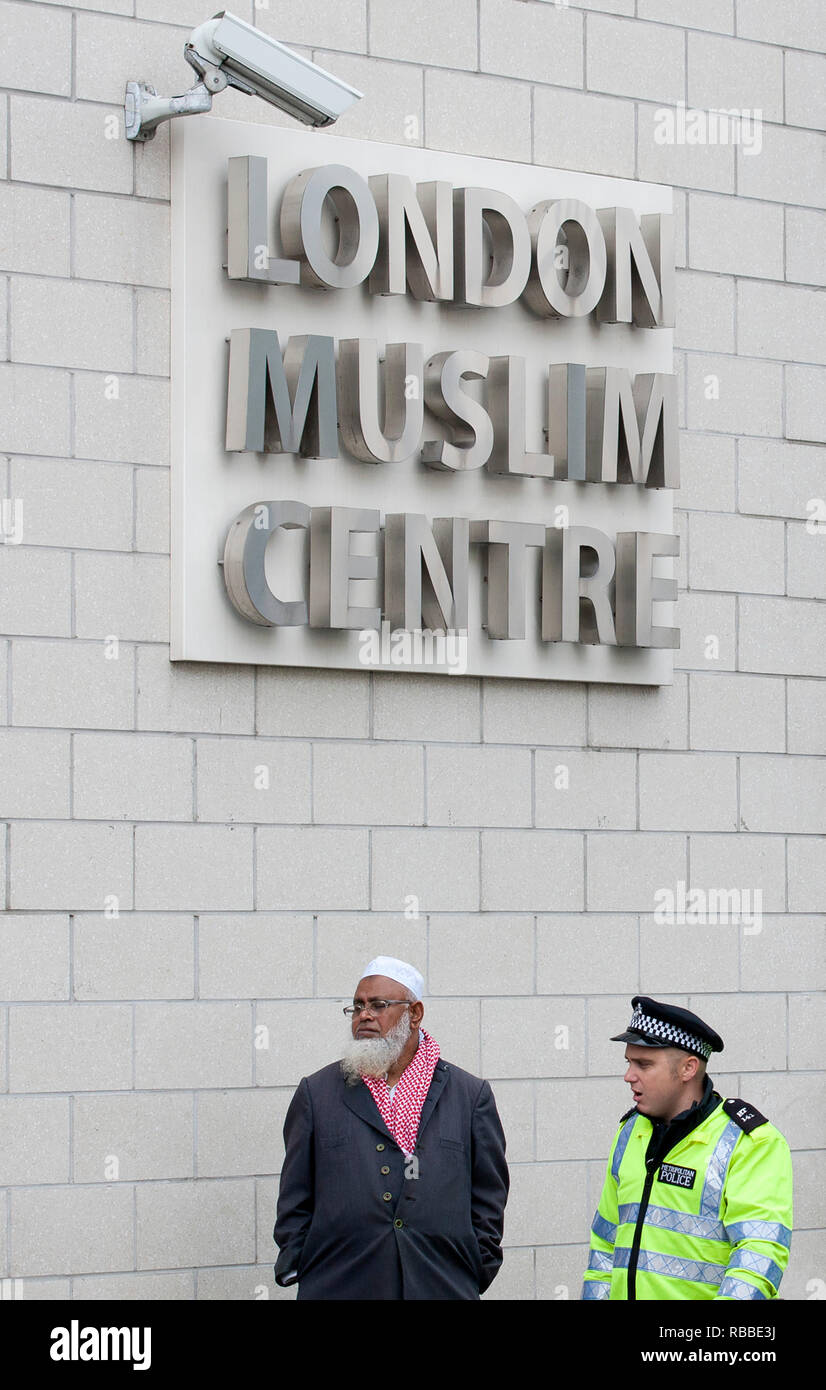Police officers patrol past The London Muslim Centre, aka East London ...