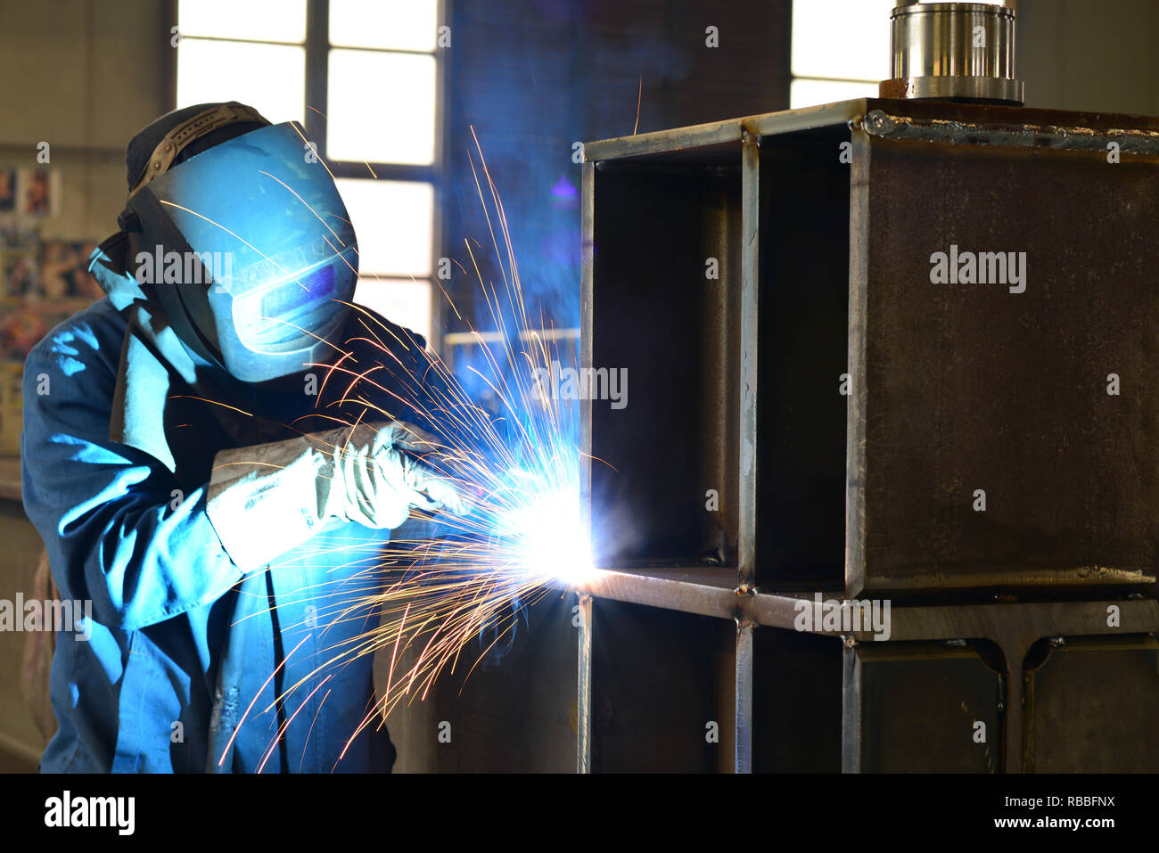 Man welding workpiece hi-res stock photography and images - Alamy
