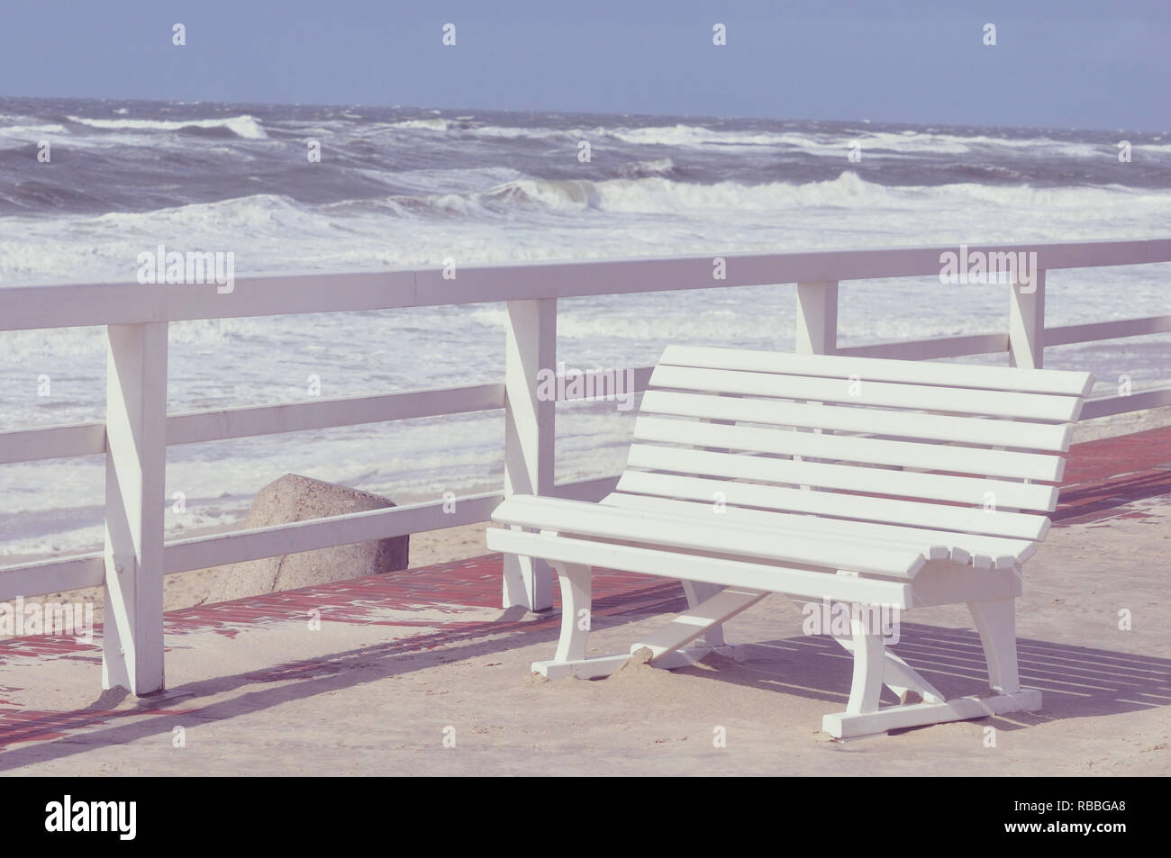 Vintage-style White bench on the beach promenade by jziprian Stock ...