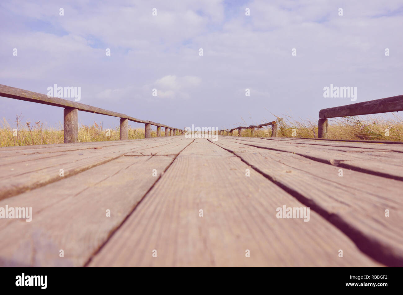 vintage-style wooden pathway by jziprian Stock Photo - Alamy