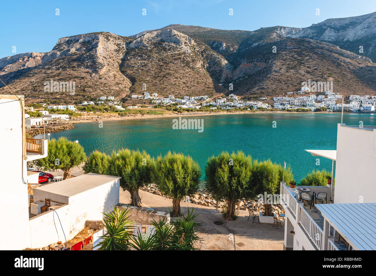 The bay of Sifnos with a long and sandy beach and crystal water ...