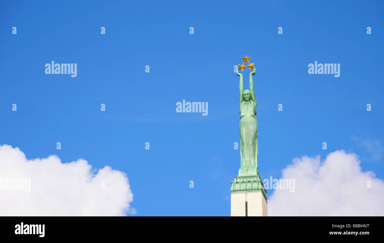Famous landscape view of statue The Freedom Monument in Latvia Riga old ...