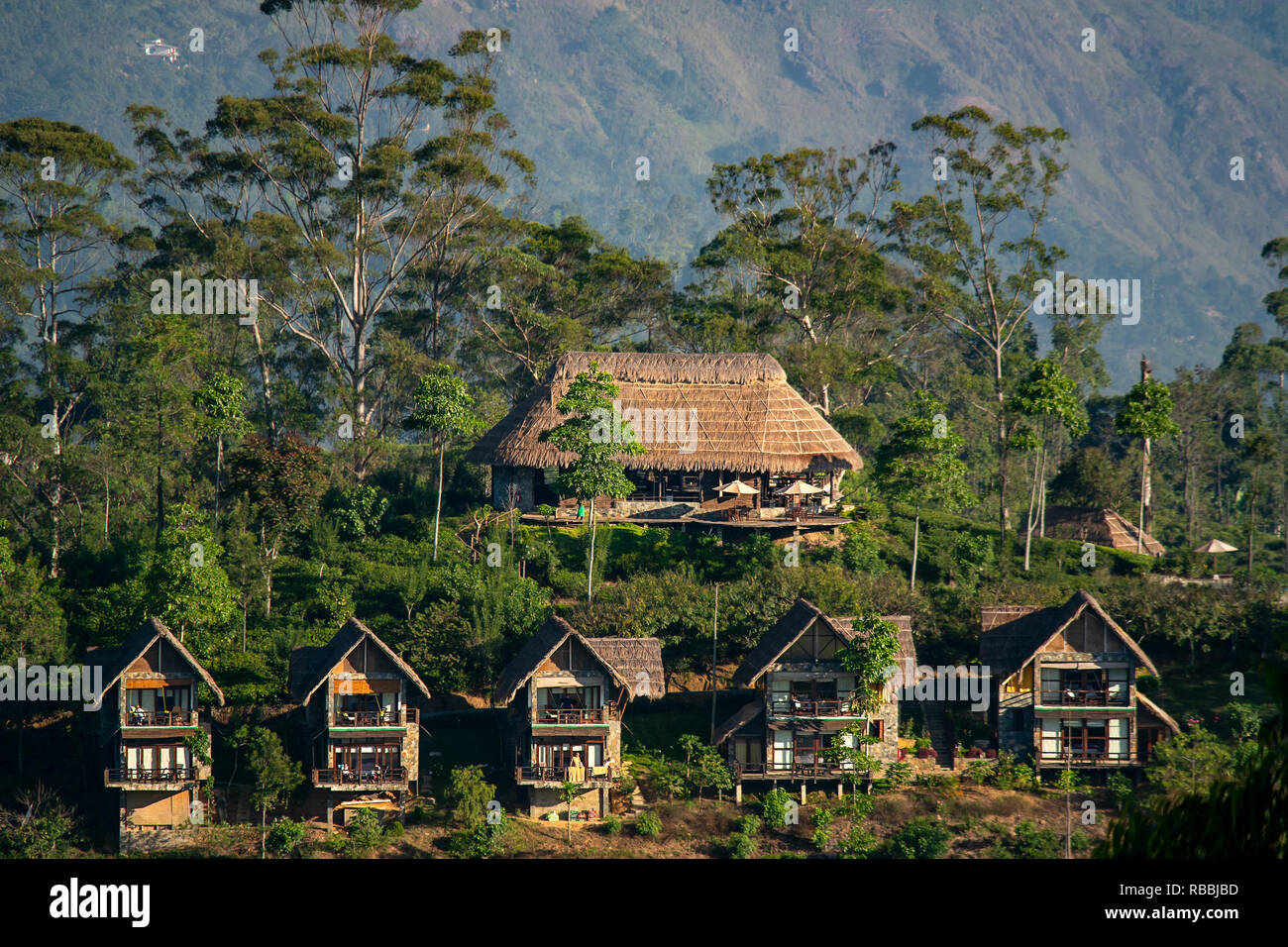 High angle view of a hillside luxury villa and resort complex in a ...