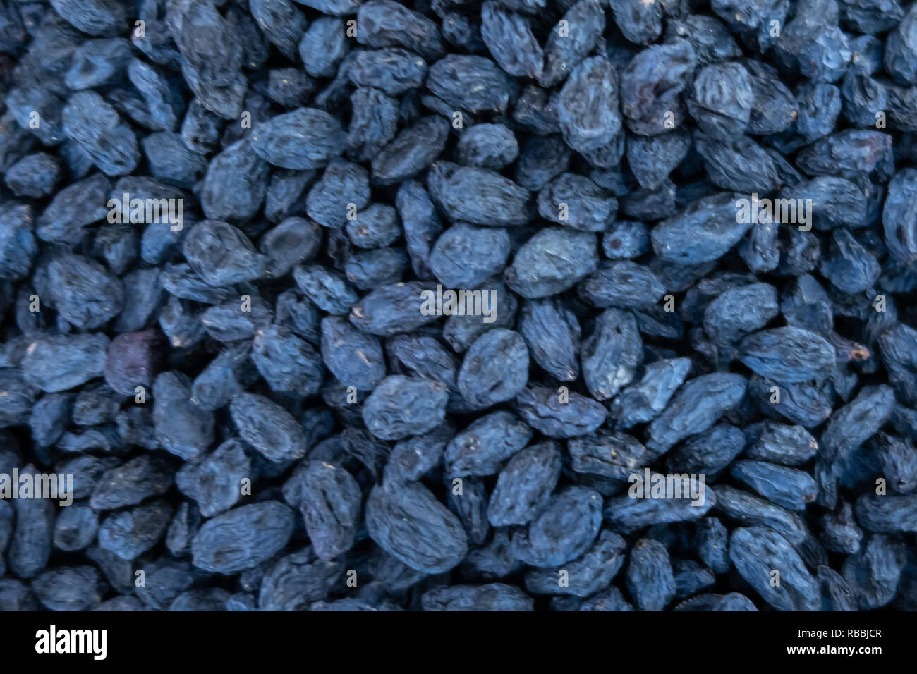 Golden raisins presented in the form of texture Stock Photo - Alamy