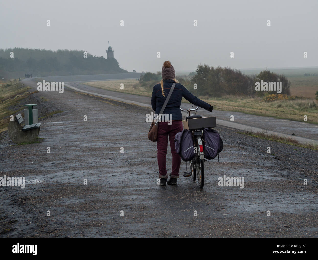 Woman On The Dike High Resolution Stock Photography and Images - Alamy