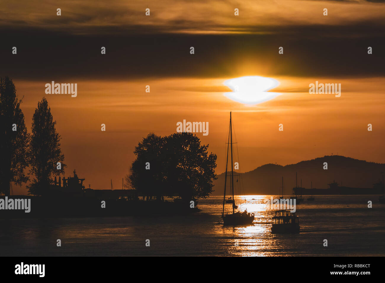 Photo of Sunset at Sunset Beach in Vancouver, BC, Canada Stock Photo ...