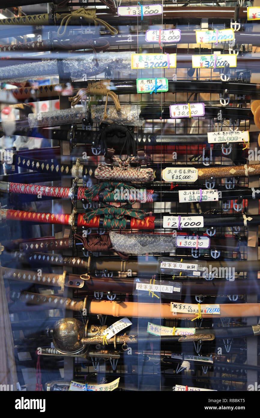 Japanese swords in store window Stock Photo - Alamy