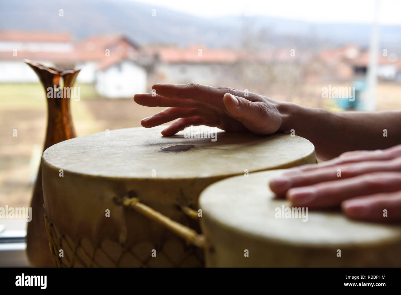 Playing the bongos hi-res stock photography and images - Alamy