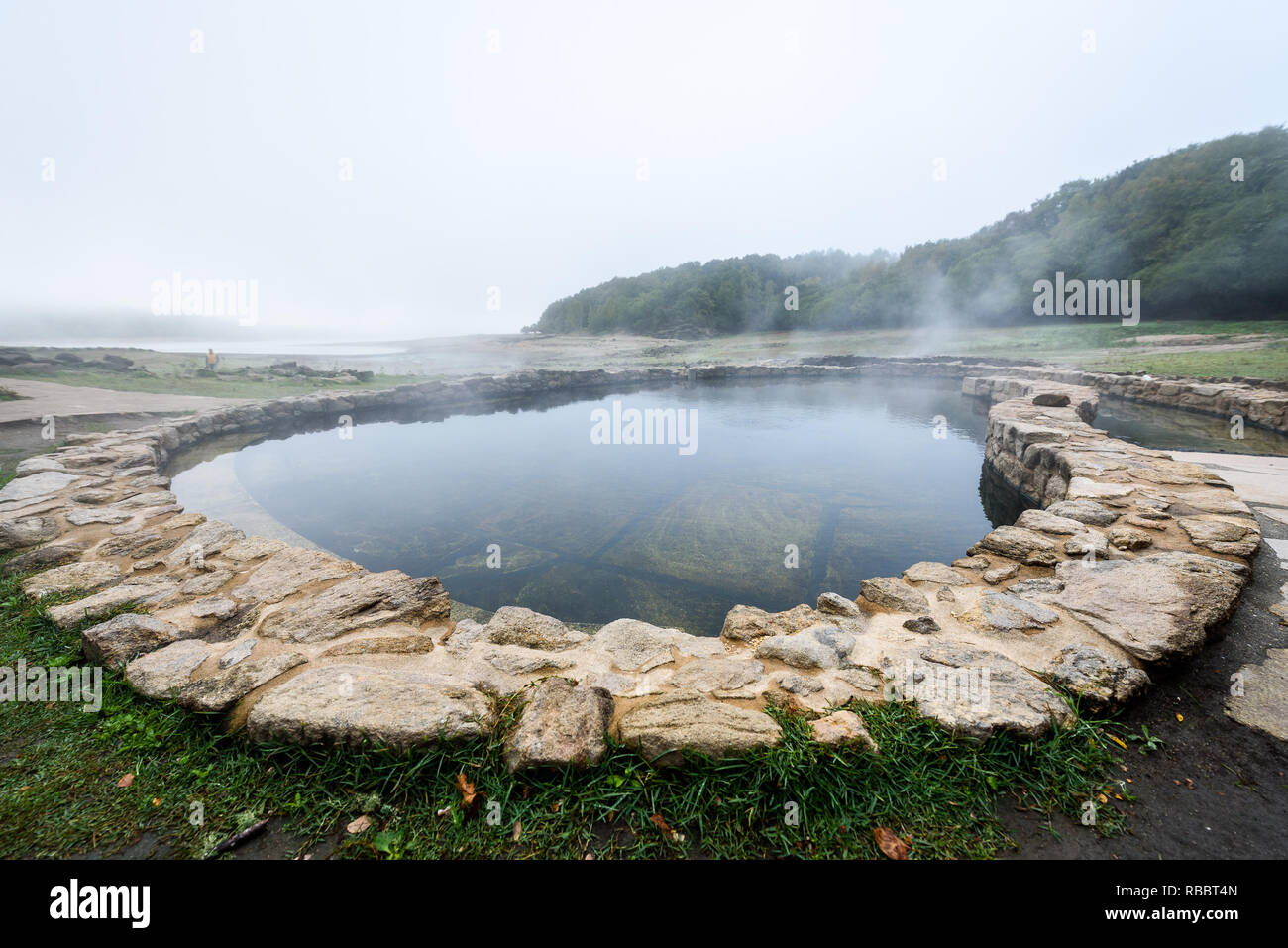 Natural Roman baths outdoors with hot steam and thermal water. Old ...