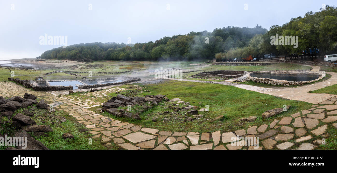 Natural Roman baths outdoors with hot steam and thermal water. Old ...