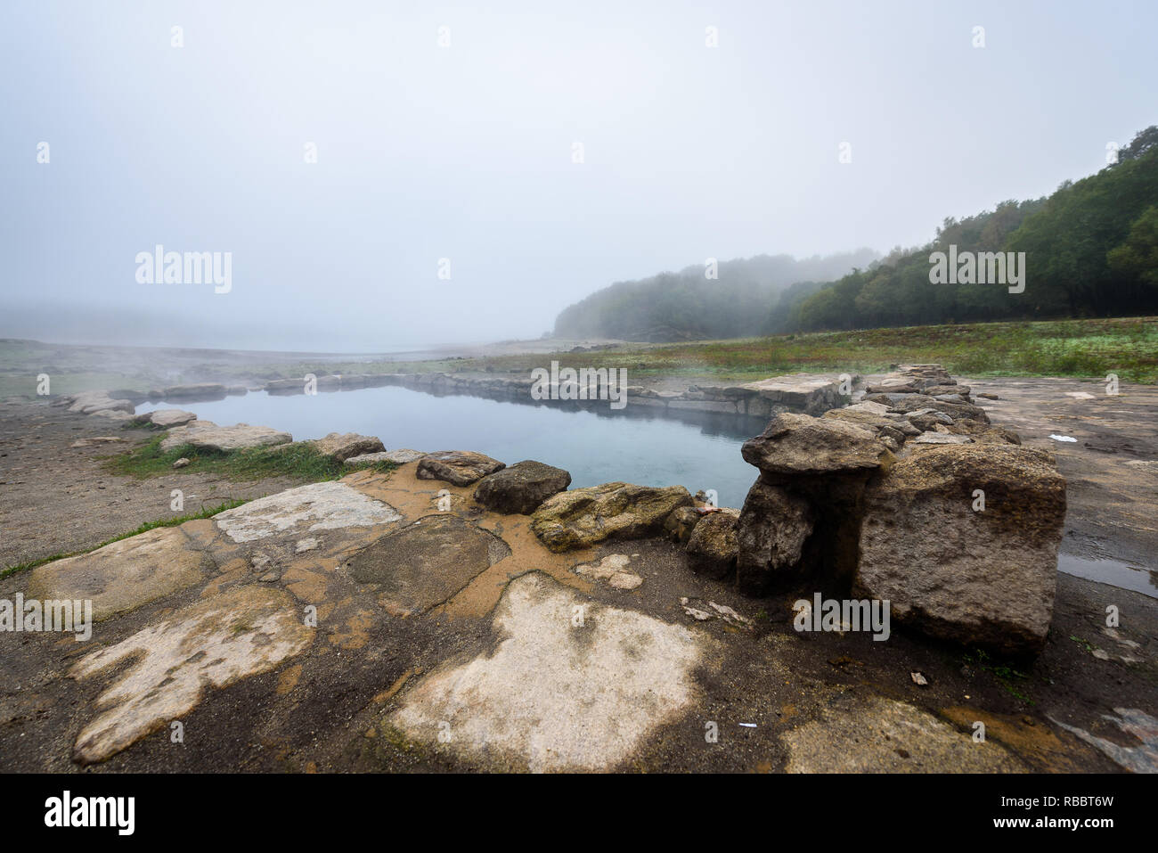 Natural Roman baths outdoors with hot steam and thermal water. Old ...