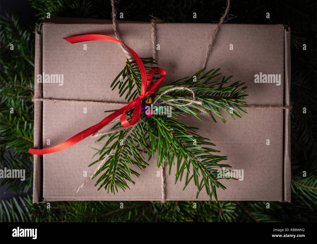 Gift box wit red ribbon Stock Photo - Alamy