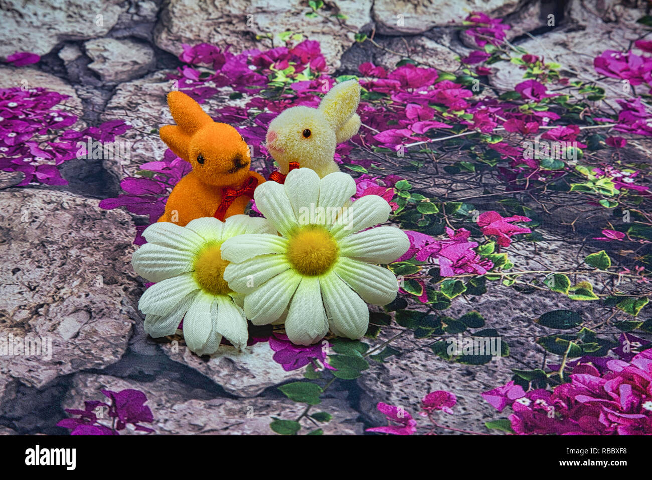 White rabbits with flowers hi-res stock photography and images - Alamy