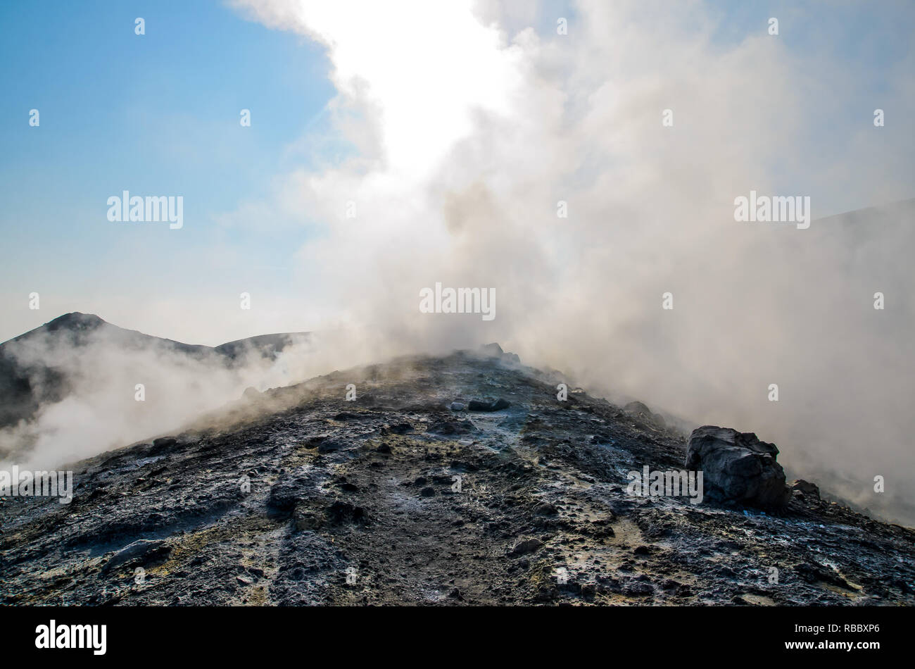 Smoke and steam coming out from the crater of the volcano in Vulcano ...