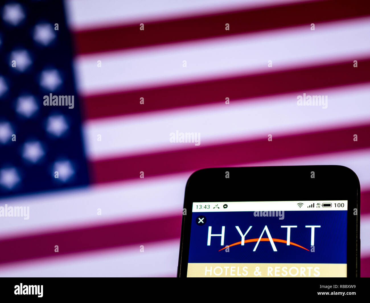 Hyatt Hotels Corporation logo seen displayed on smart phone Stock Photo ...