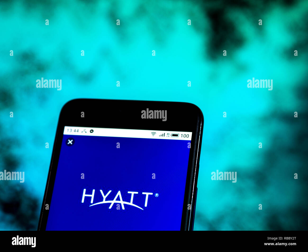 Hyatt Hotels Corporation logo seen displayed on smart phone Stock Photo ...