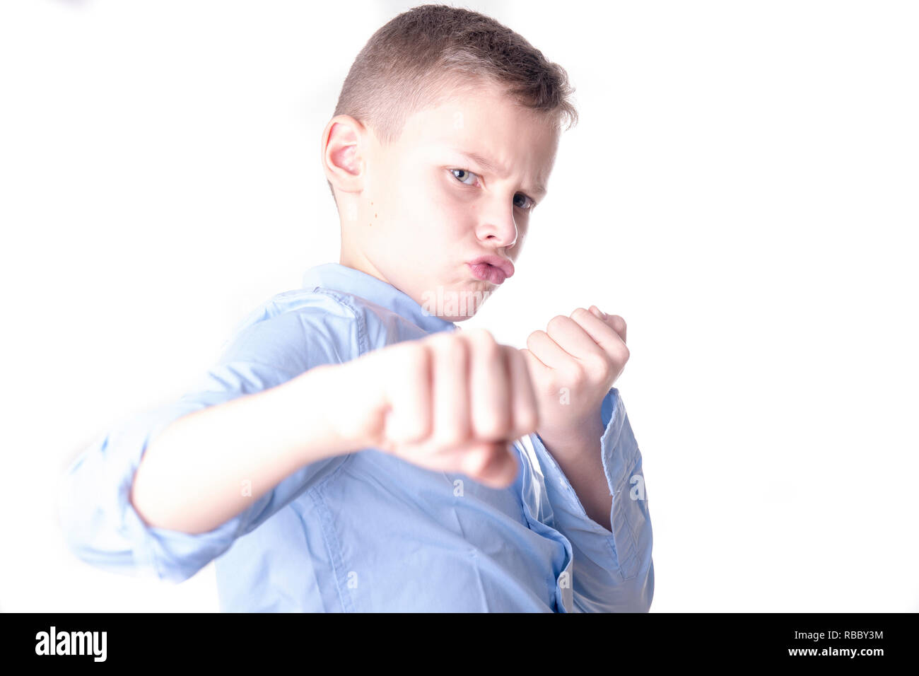 Violence in school - fist of a young child in front of his face Stock ...
