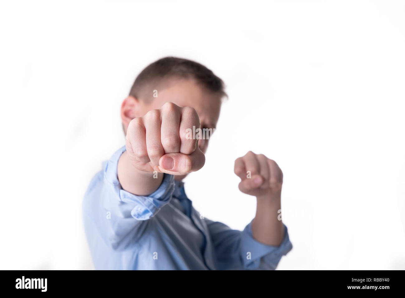 Violence in school - fist of a young child in front of his face Stock ...