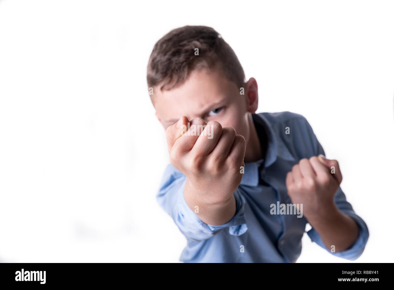 Violence in school - fist of a young child in front of his face Stock ...