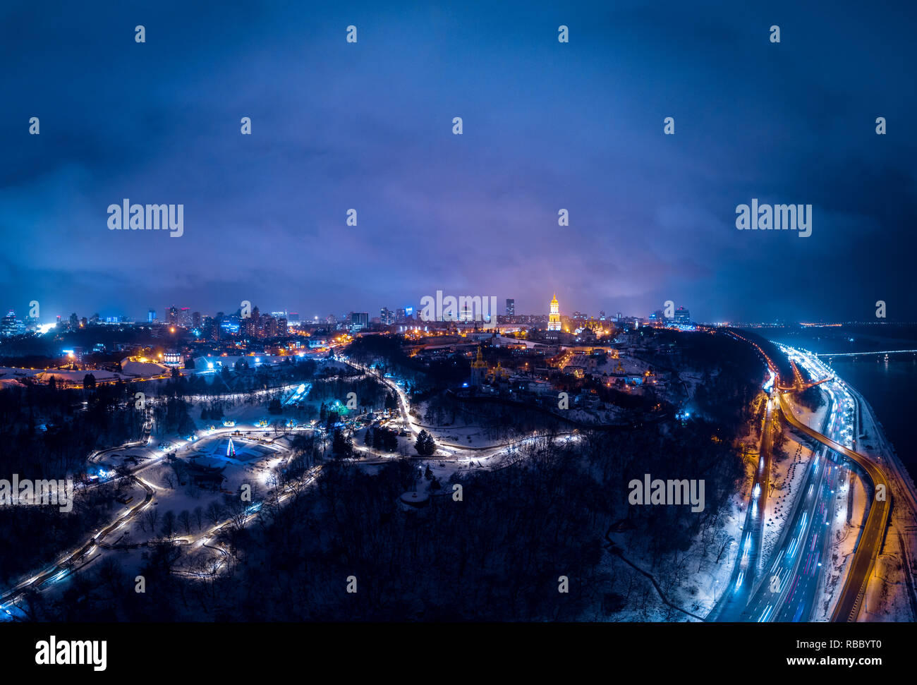 Spectacular nighttime skyline of a big city at night. Kiev, Ukraine ...