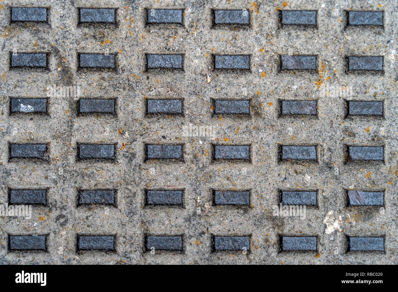 Rectangular shapes on metal rusted surface with patterns and cracks ...