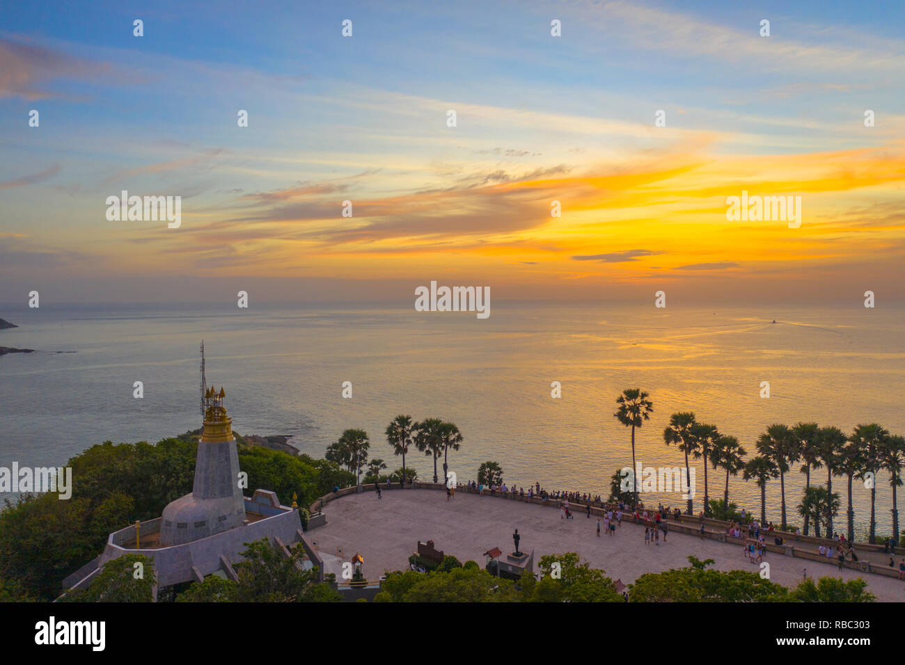 sunset above the great lighthouse at Promthep cape Phuket Thailand ...