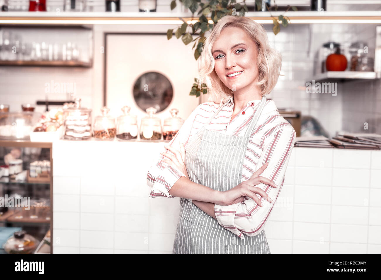 Positive attractive young woman being at work Stock Photo - Alamy