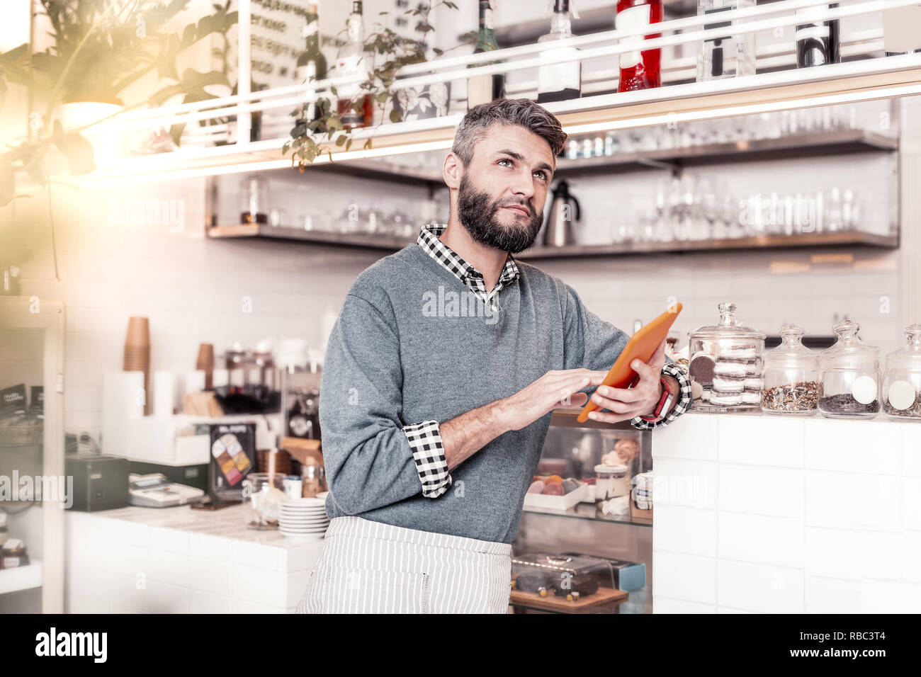 Intelligent good looking man thinking about new ideas Stock Photo - Alamy