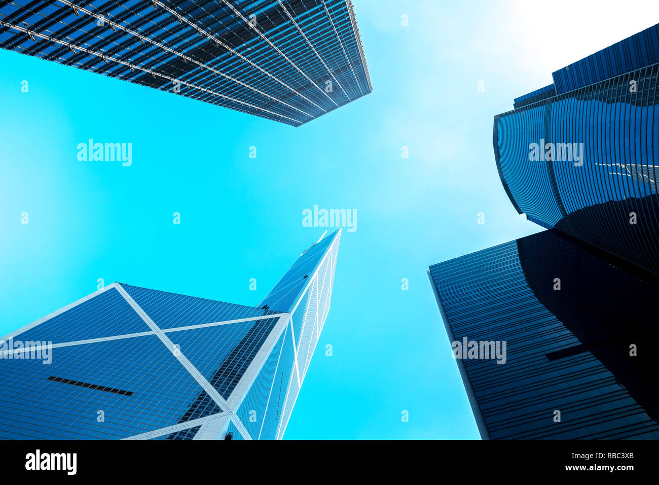 Bottom up view of Modern office building in Hong Kong Stock Photo - Alamy