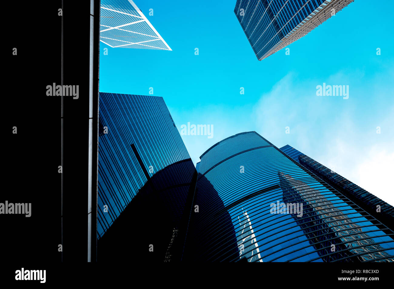 Bottom up view of Modern office building in Hong Kong Stock Photo - Alamy