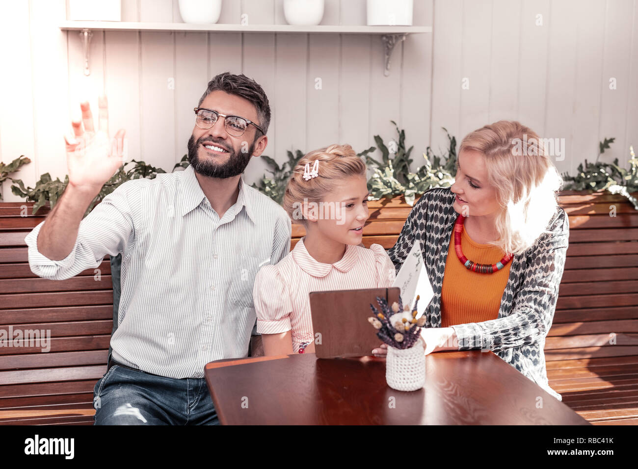 Woman raising child man hi-res stock photography and images - Alamy