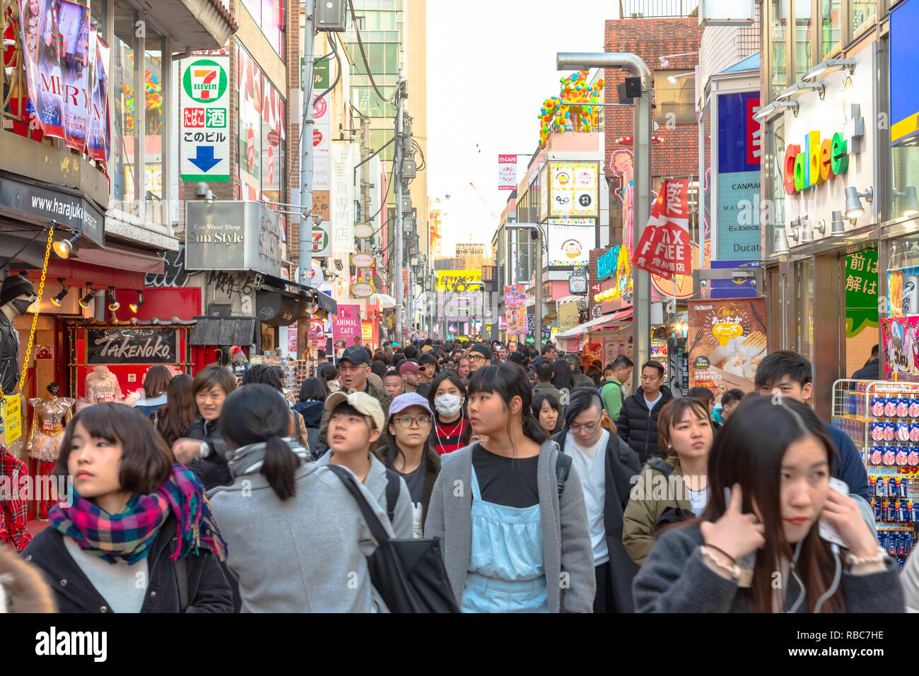 Harajuku street view. People, mostly youngsters, walk through Takeshita ...