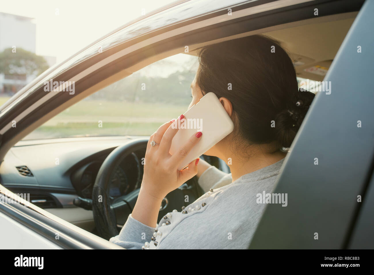 Driving mobile speaking hi-res stock photography and images - Alamy