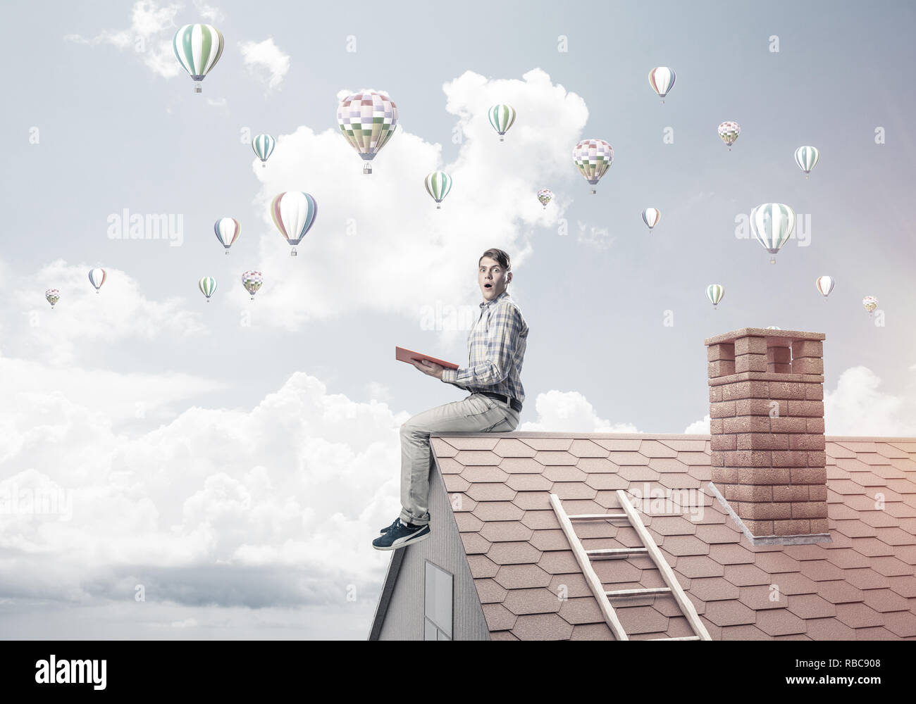 Handsome student guy reading book and aerostats flying in air Stock ...