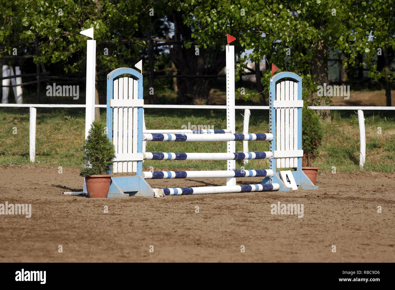 Colorful photo of equestrian obstacles. Empty field for horse jumping ...
