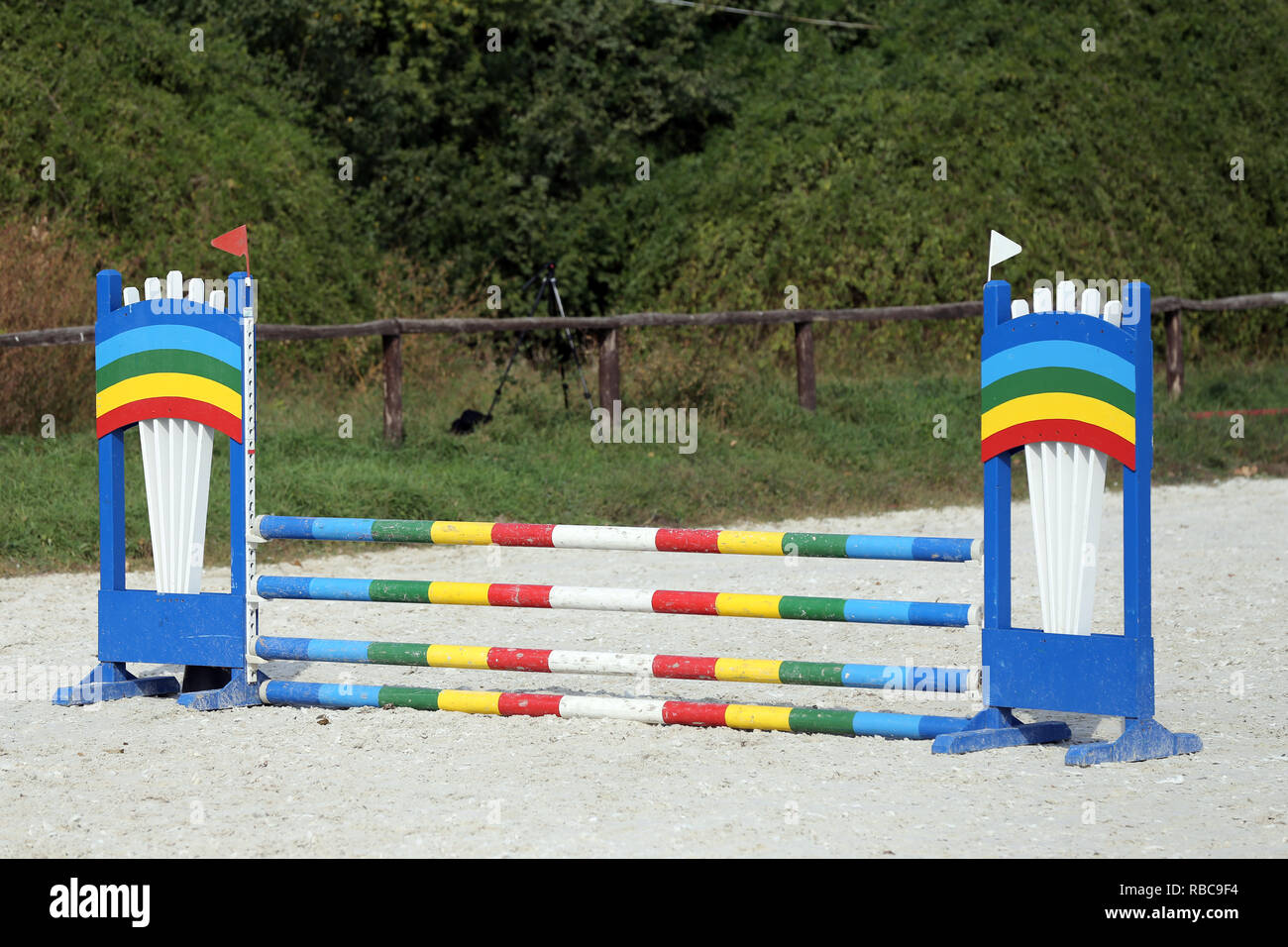 Colorful photo of equestrian obstacles. Empty field for horse jumping ...