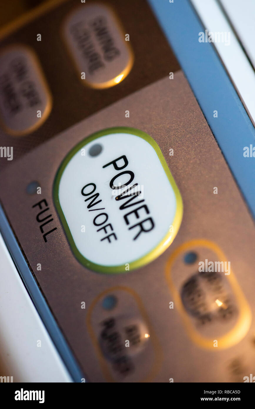 Power on button on electrical device. Close up button. Switch on/off ...