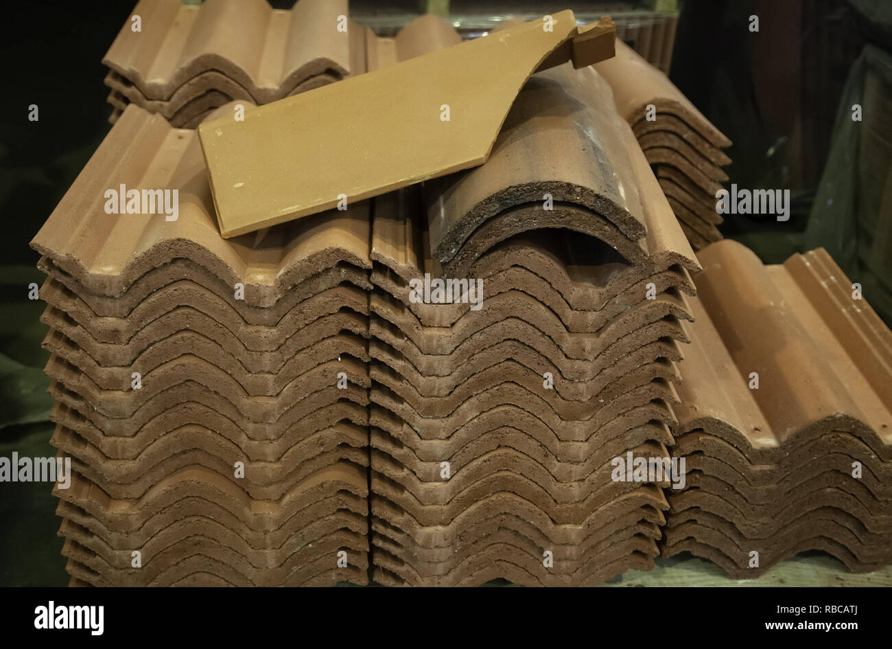 Heap of bricks in industrial factory, material work Stock Photo - Alamy