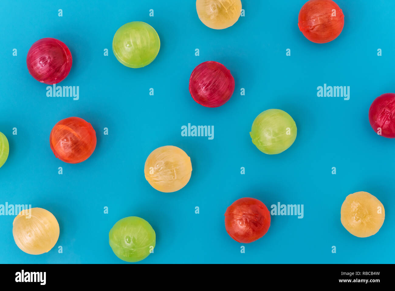 Still life of colorful spherical candies. Flat lay Stock Photo - Alamy