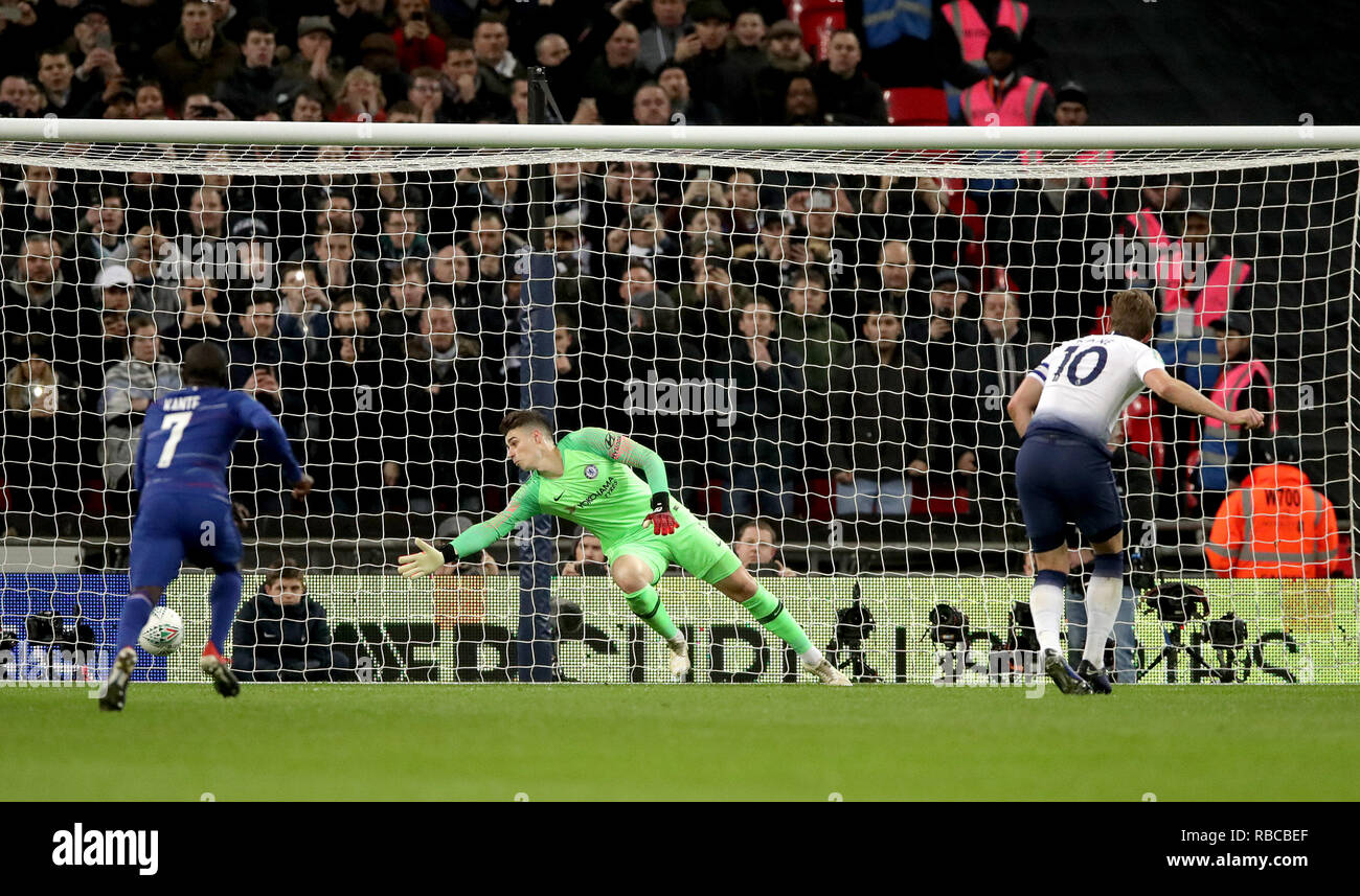 Tottenham Hotspur's Harry Kane (right) scores his side's first goal of ...