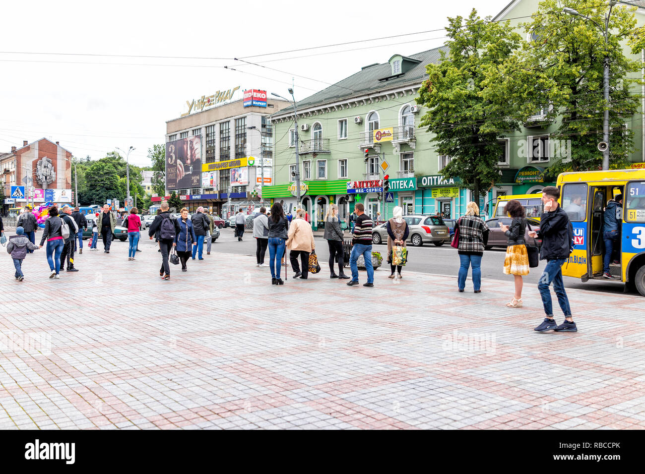 Rivne, Ukraine - July 3, 2018: Main square with trolley buses, stores ...