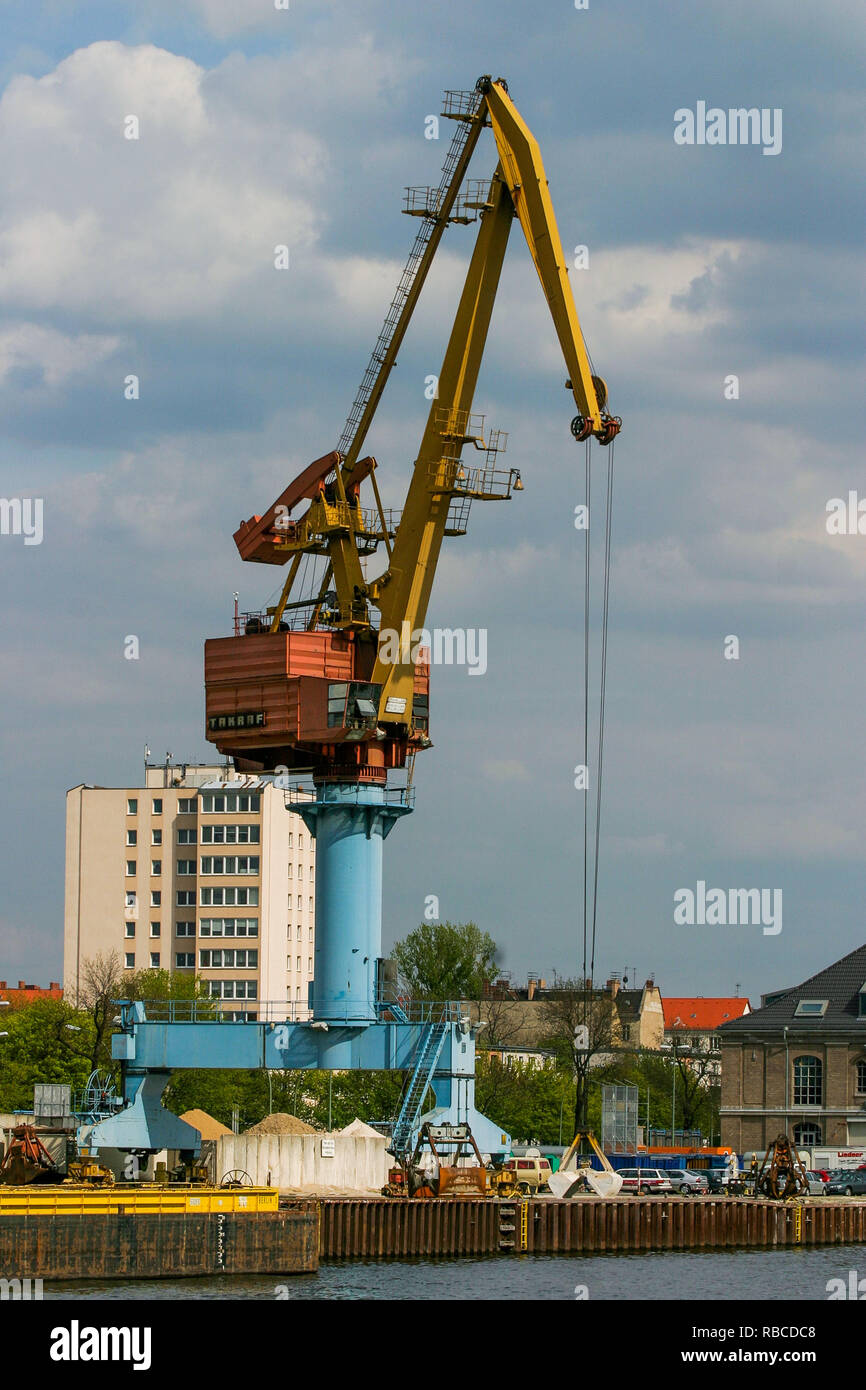 Crane on the Spree river bank, Berlin, Germany Stock Photo - Alamy