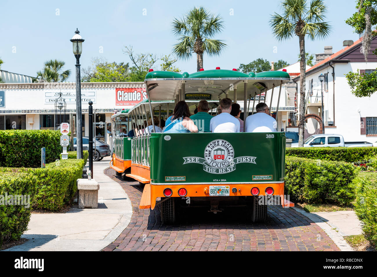 St. Augustine, USA - May 10, 2018: People riding tour bus in historic ...