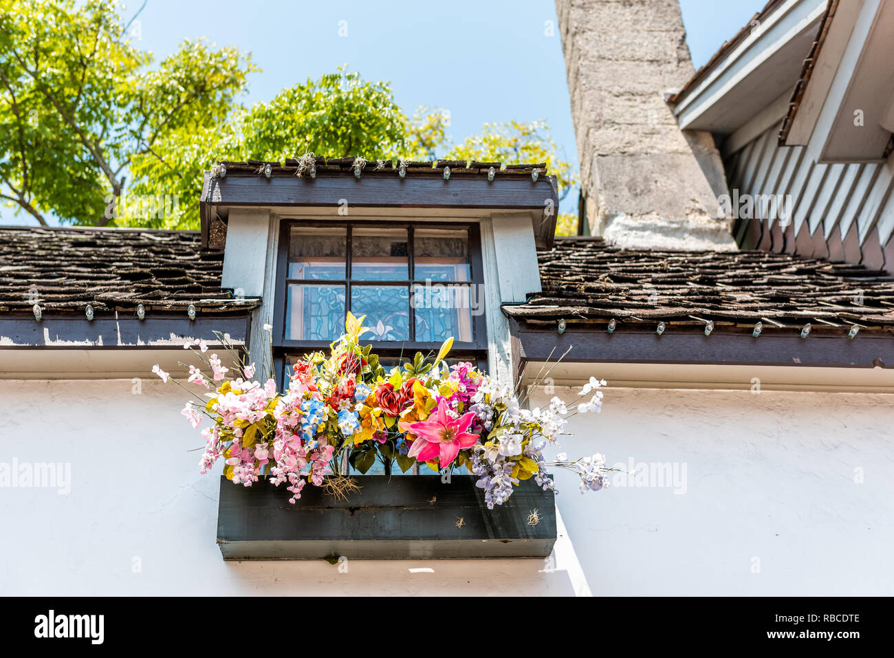 European town village city with closeup of historic window and colorful ...