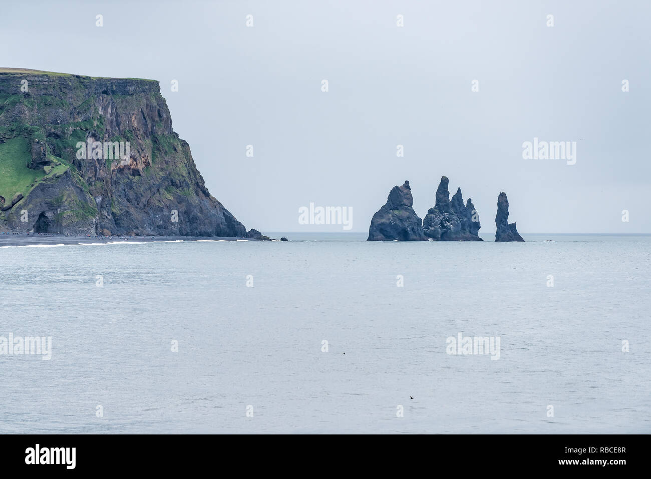 Vik, Iceland landscape cliff rocks in far distant ocean horizon and ...