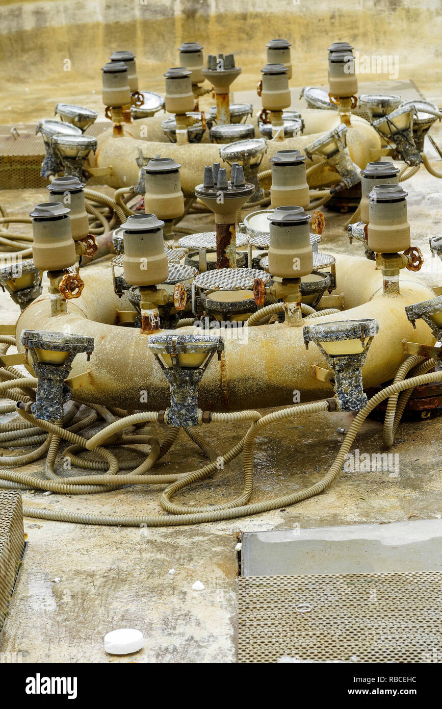 vertical view of the pipe system and lights from an empty source during ...
