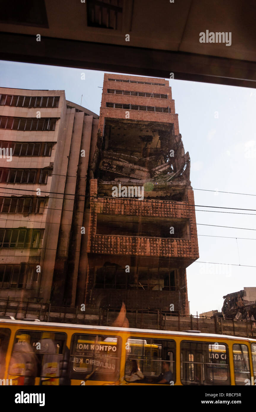 Belgrade, Serbia - June 09, 2013: View from autobus window on destroyed ...