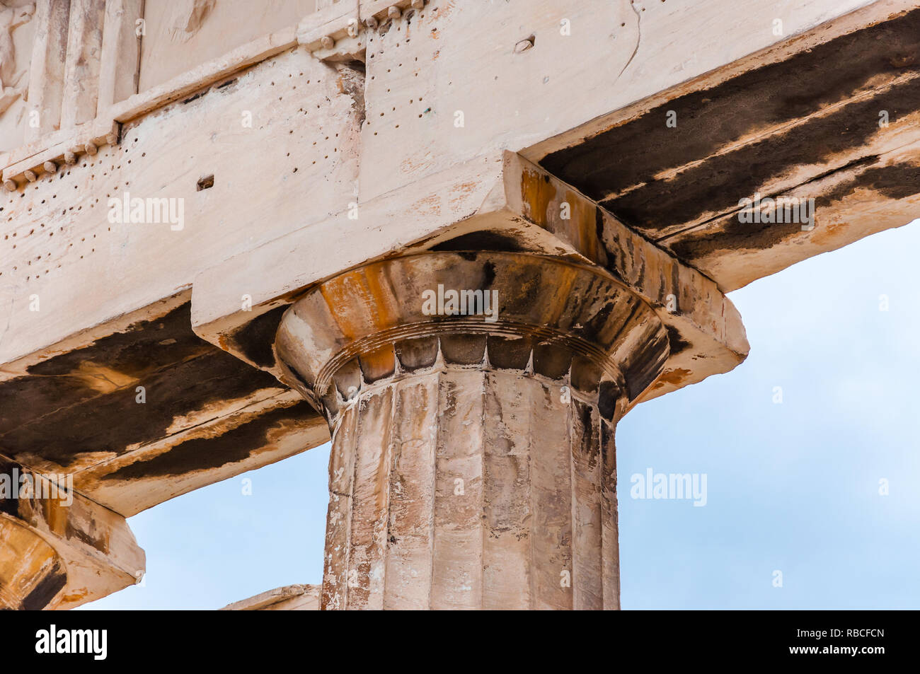 Remains of ancient wavy, corrugated, ribbed columns fragments made of ...