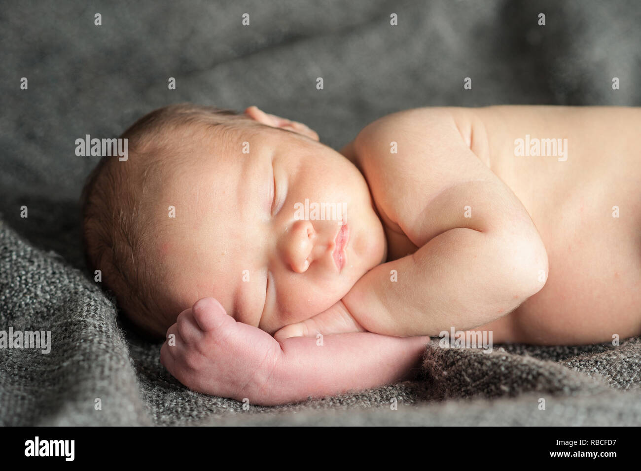 Sleep sleeping newborn baby child bed blanket hi-res stock photography ...
